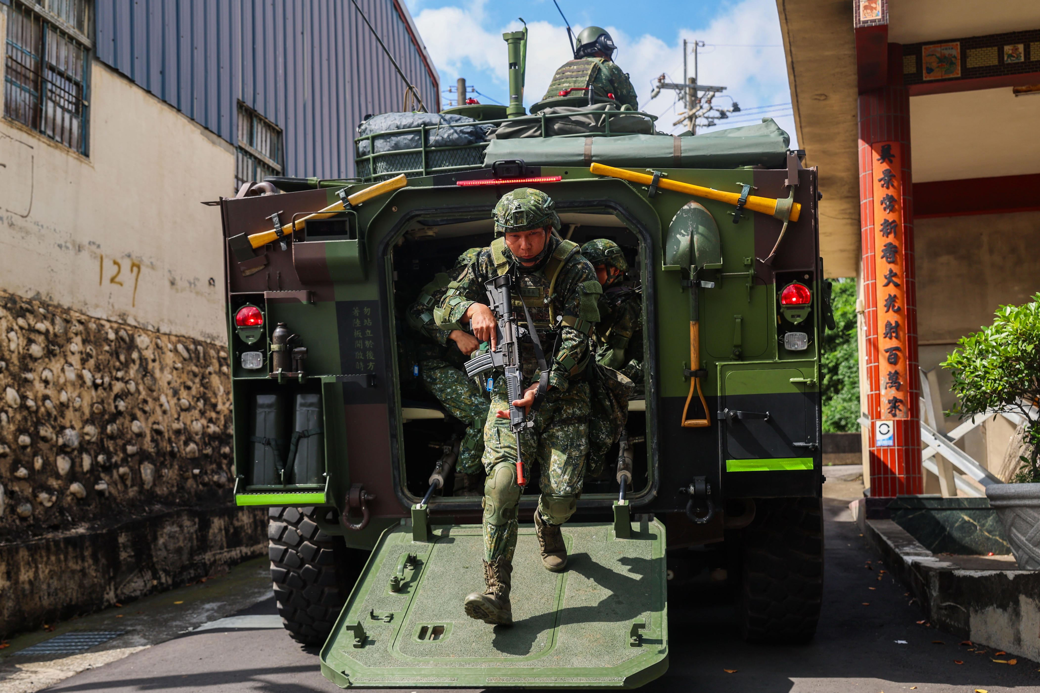 Taiwan is sending everyone a handbook to prepare them for war. Here's ...