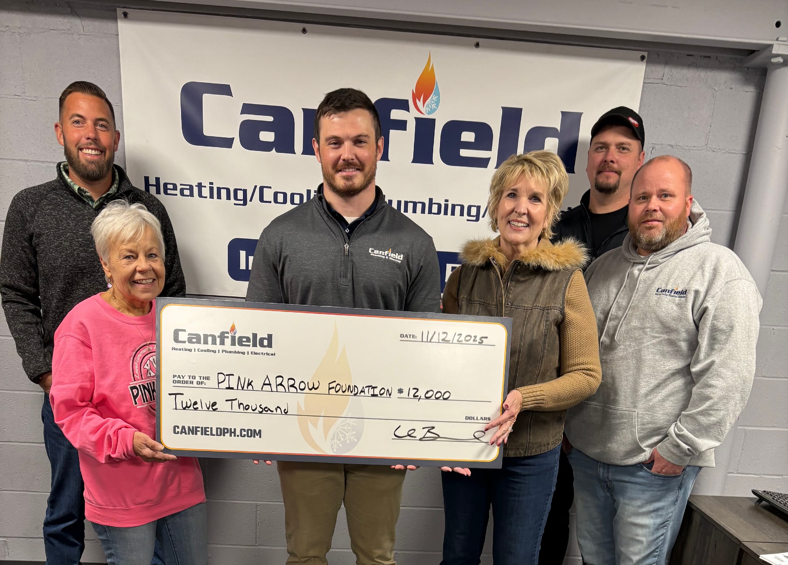 Canfield Makes $12,000 Donation to Pink Arrow