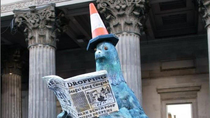 Artist swaps Duke of Wellington traffic cone for paper-reading pigeon