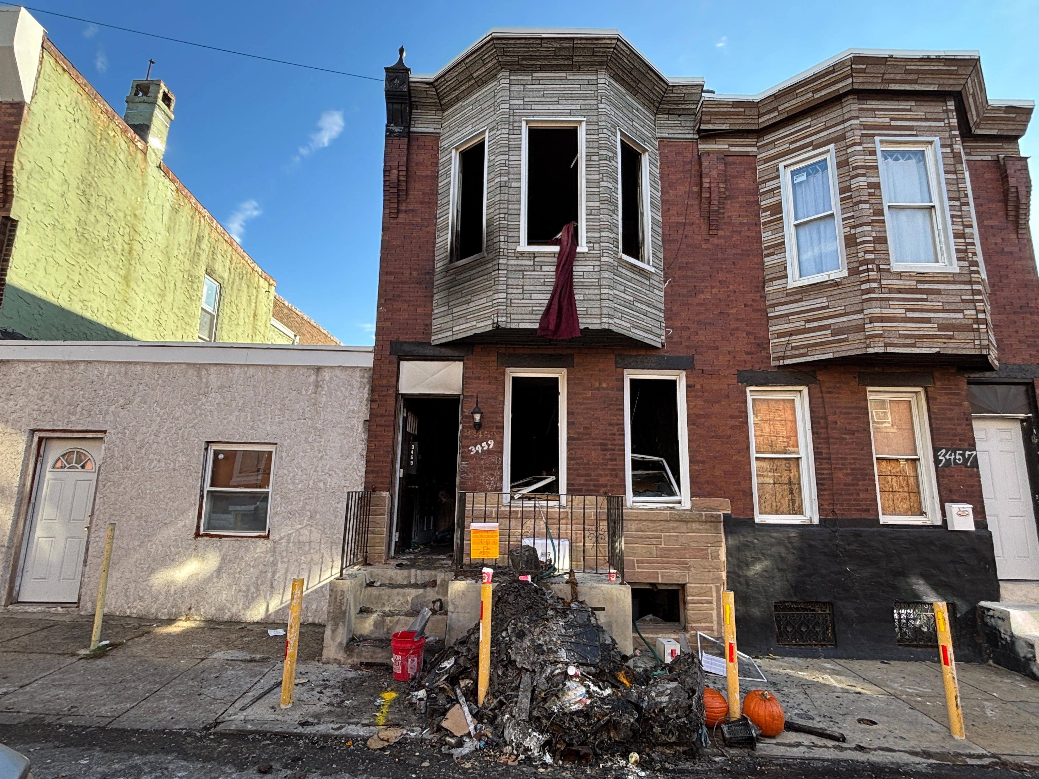 Woman, 2 young children killed in North Philadelphia row home fire