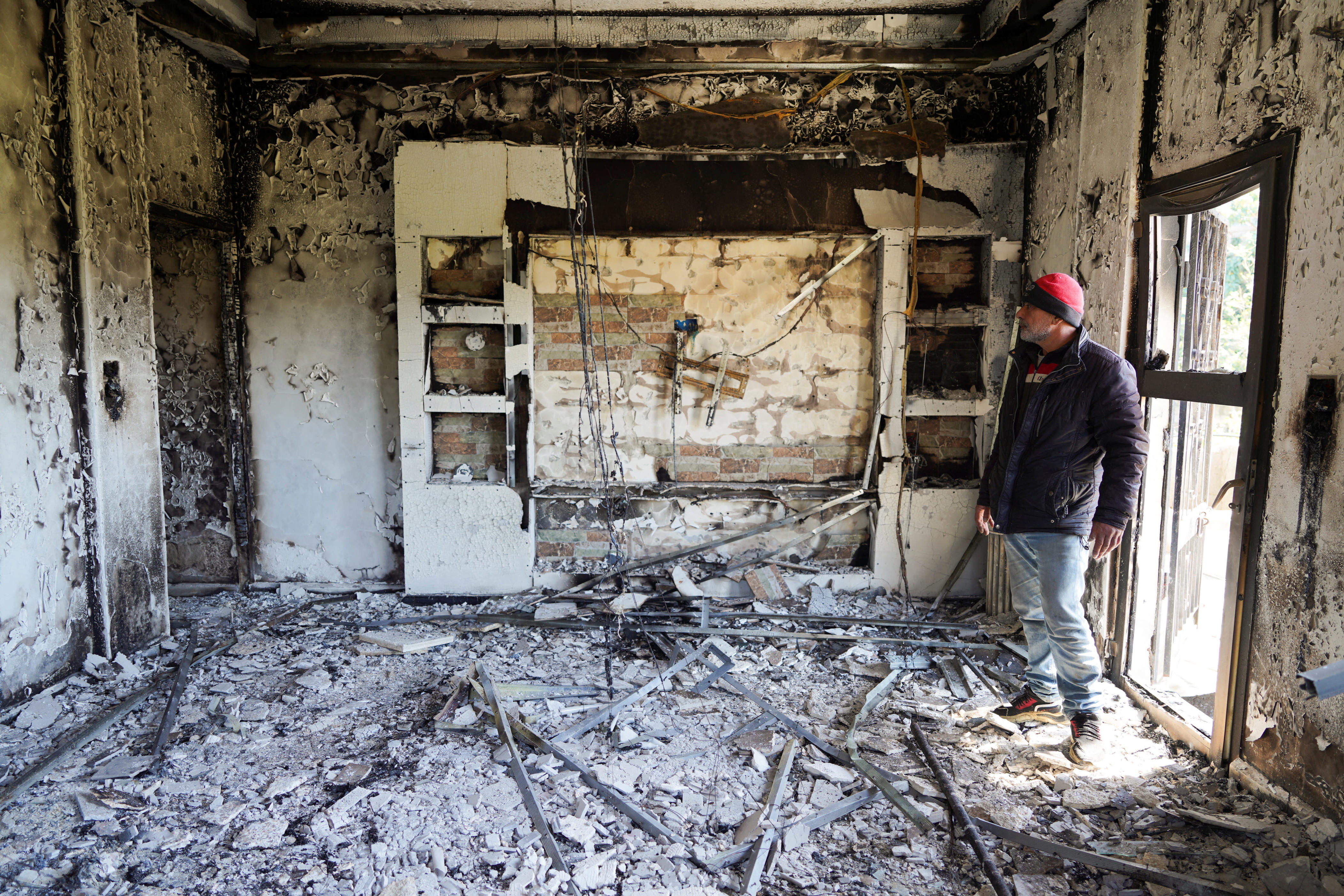 Syria opens first trial against suspects in mass killing of Alawite ...