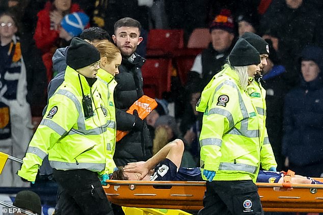 Premier League star in tears as he's taken off on a stretcher in ...