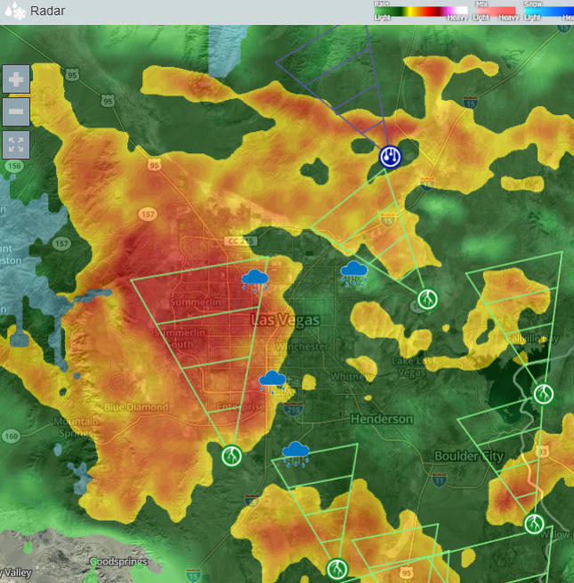 Rain causes delays at Las Vegas airport, snow on the mountains