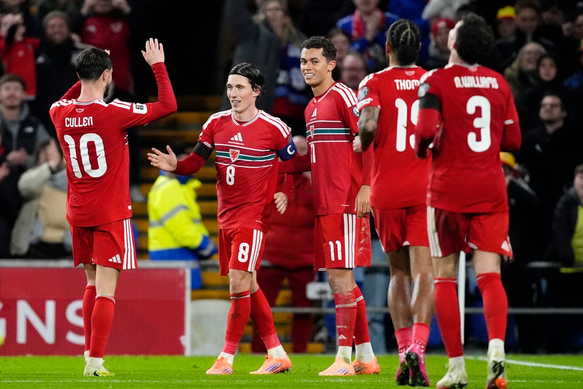 Wilson treble gives Wales home semi-final advantage in play-offs