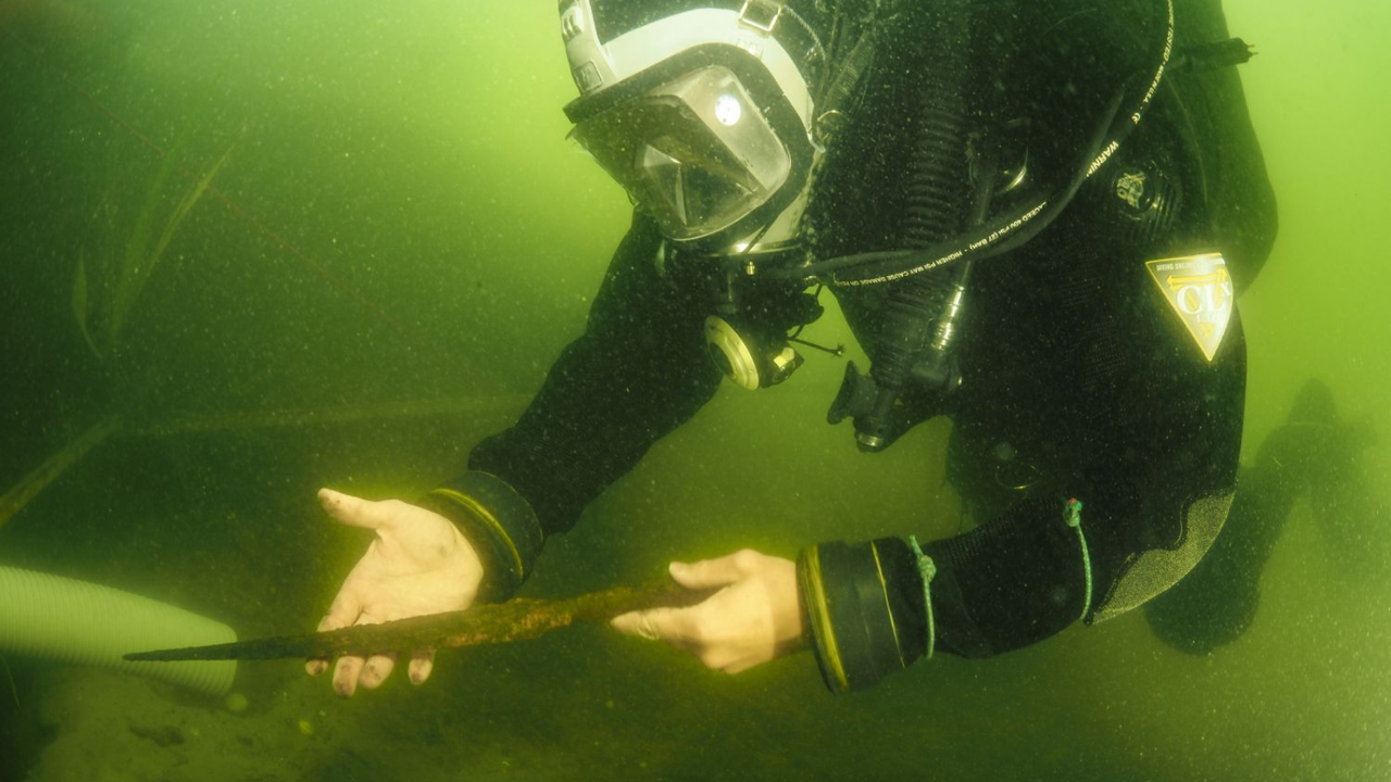 Medieval spear pulled from Polish lake may have belonged to prince or ...