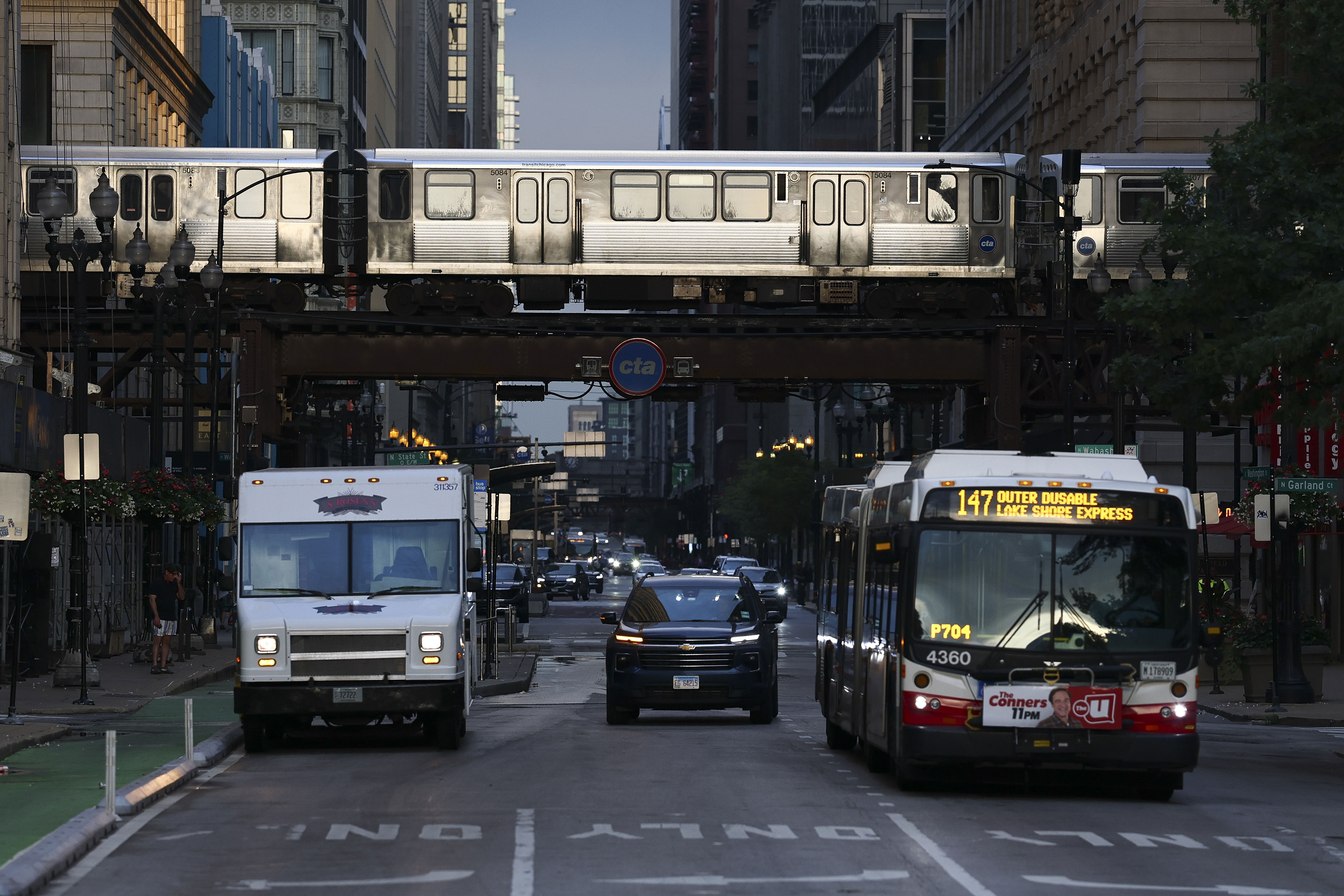 Woman set on fire during Chicago train argument, manhunt underway