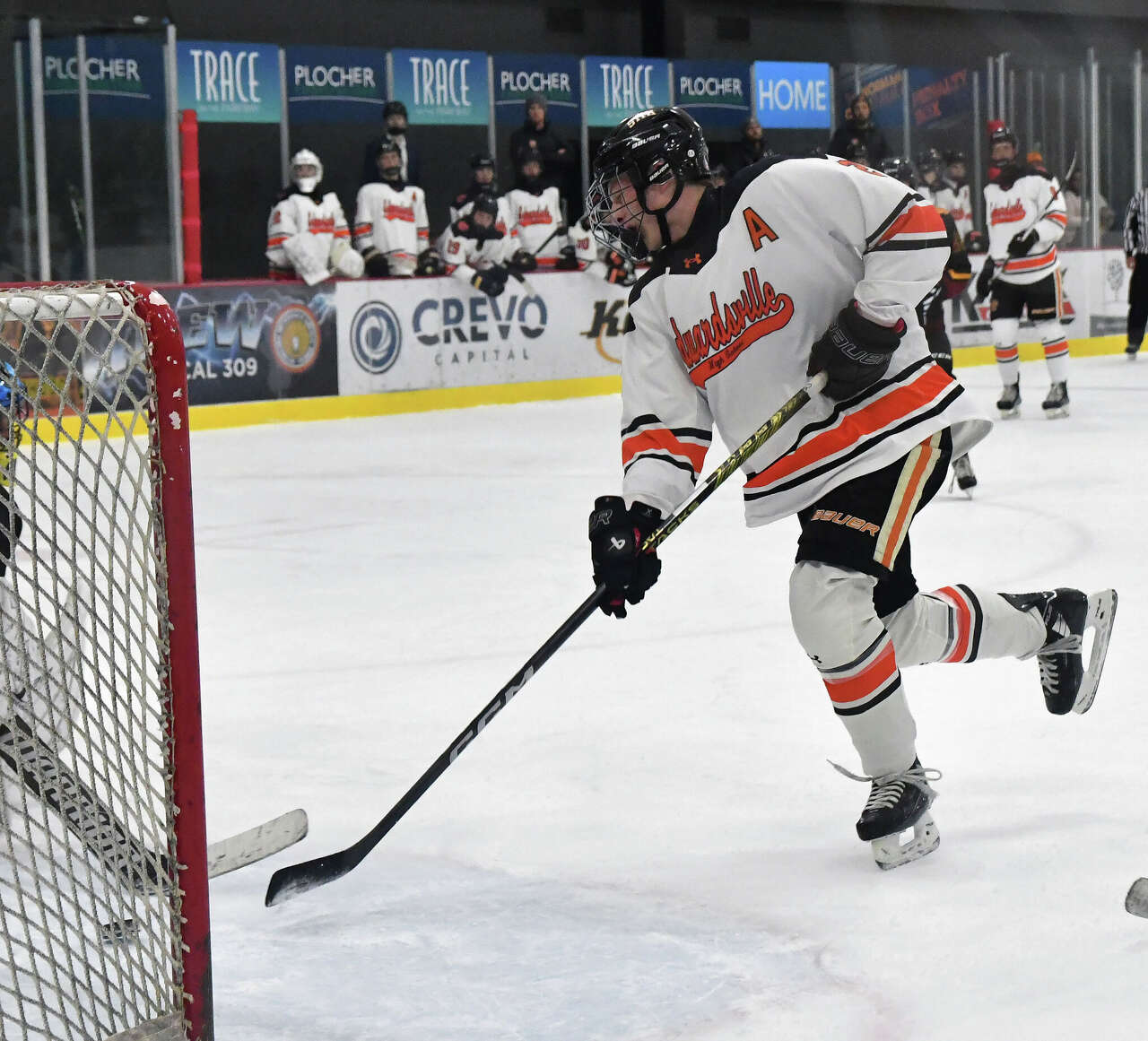 Wolfe's four-point night lifts EHS hockey to home win