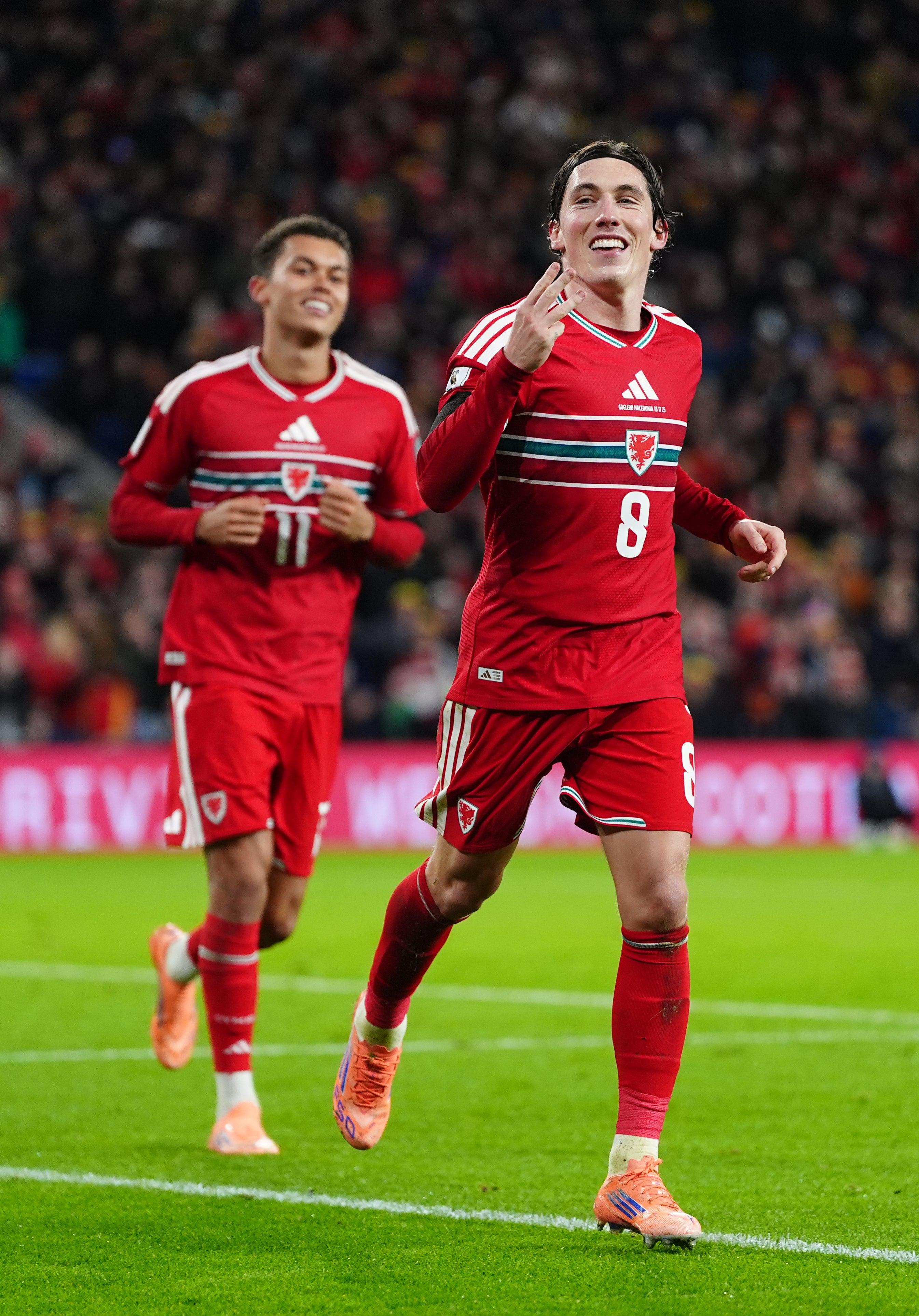 Wilson treble gives Wales home semi-final advantage in play-offs