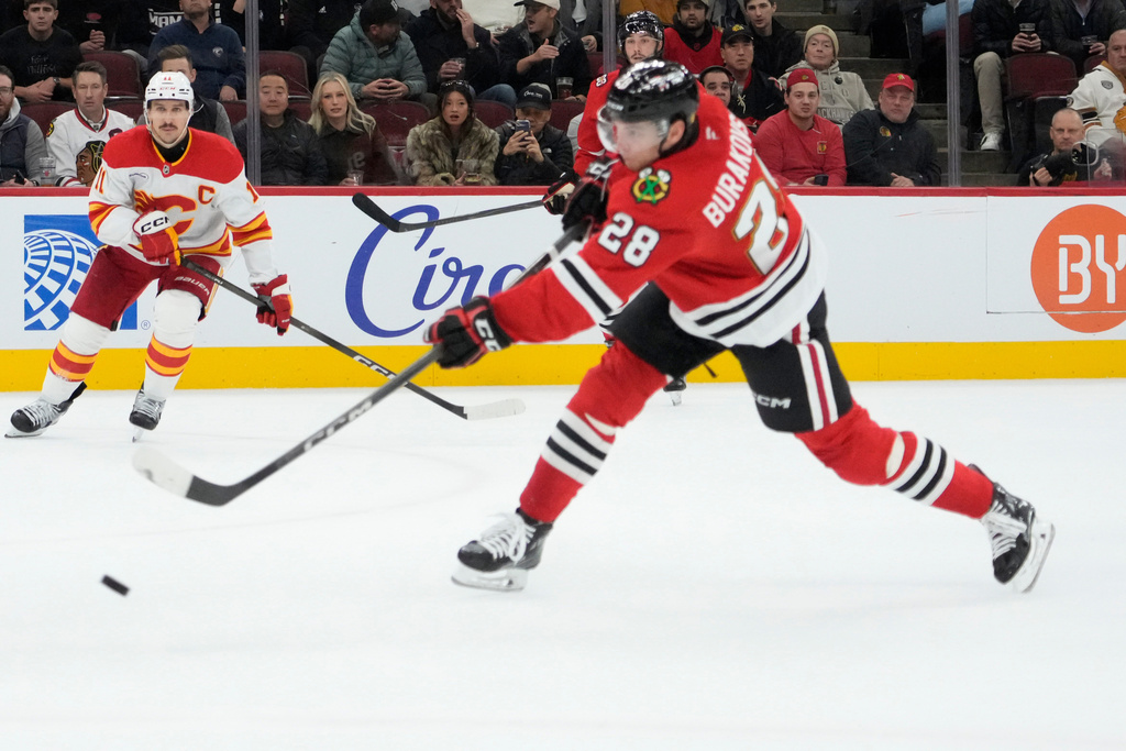 Connor Bedard scores 3 times as the Blackhawks beat the Flames 5-2