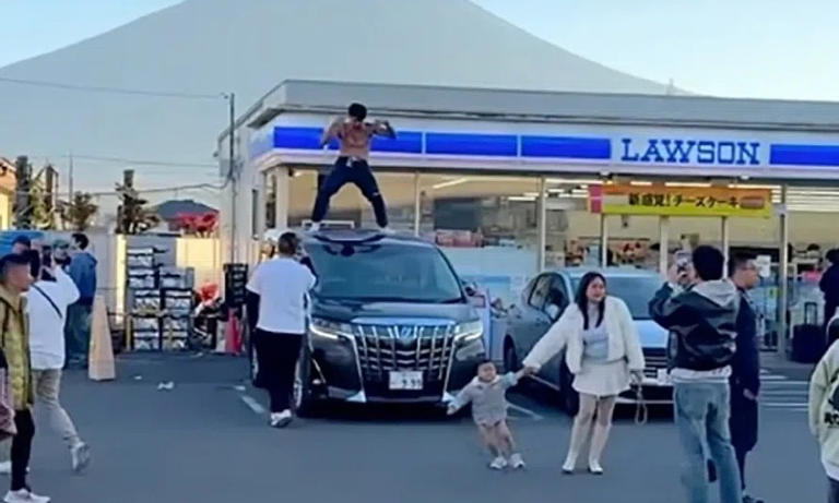 Thai YouTuber draws backlash after dancing shirtless on car roof at ...