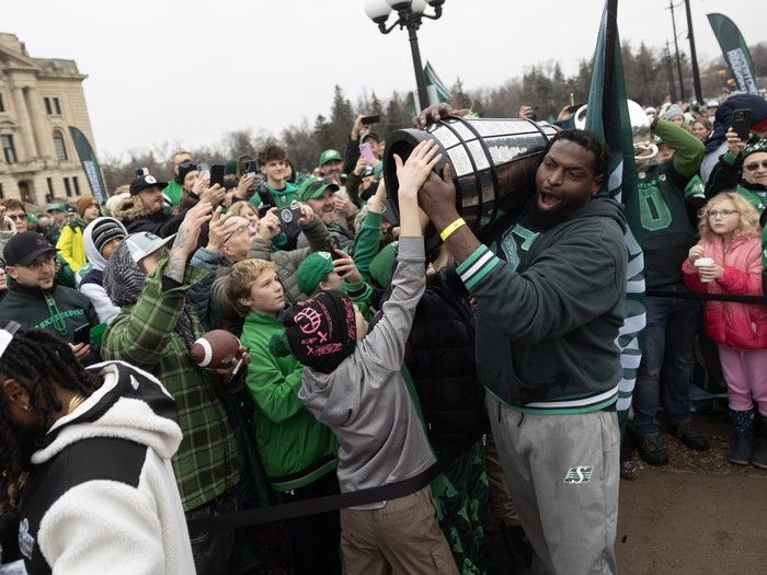 Parade of champions: Rider fans gather along Regina's Green Mile for ...
