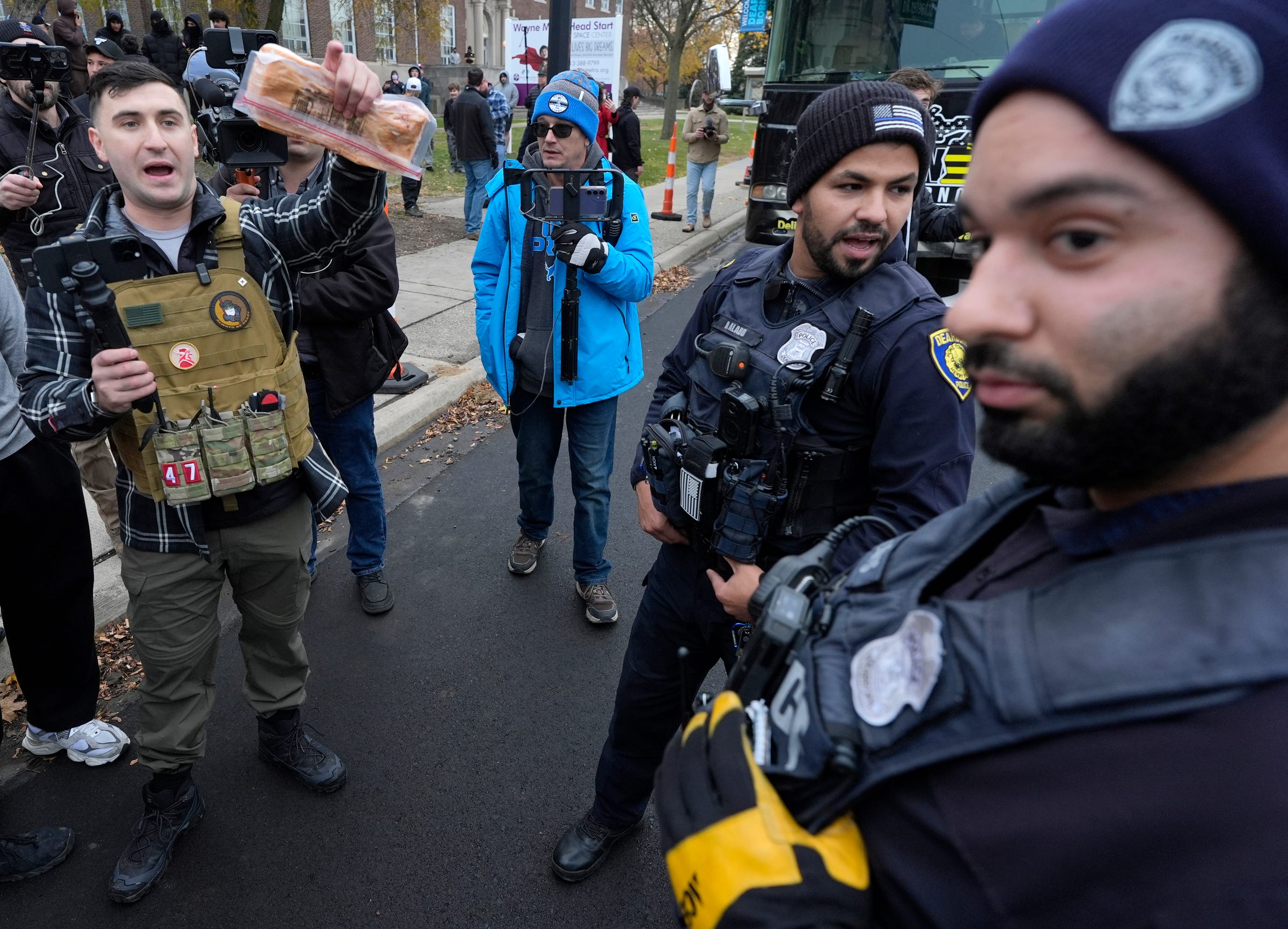 Protesters scuffle in Dearborn over faith as Quran-burning attempt is ...