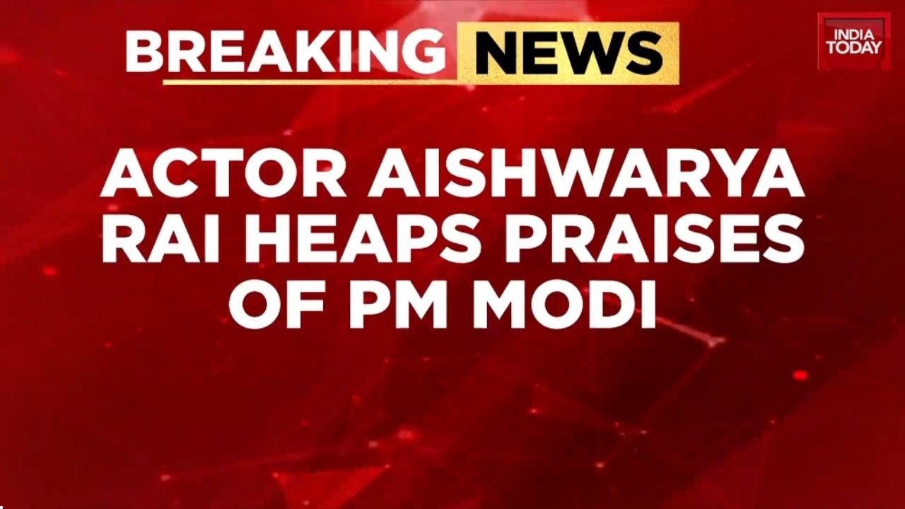 Aishwarya Rai Praises PM Modi, Touches His Feet at Sathya Sai Baba ...