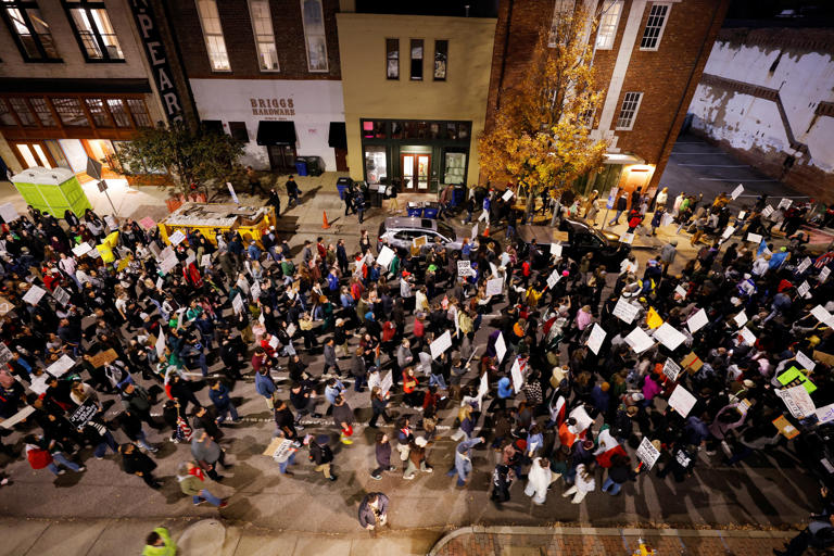 Protesters march in North Carolina as immigration crackdown expands