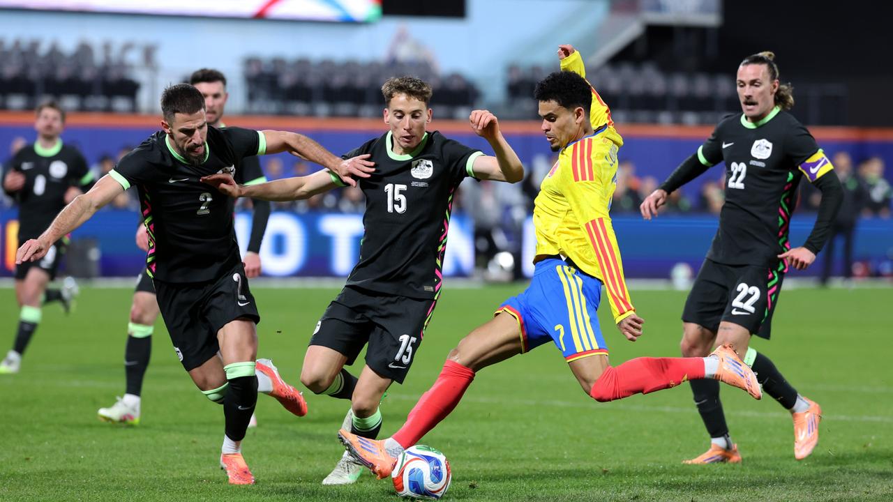 Sick Socceroos suffer third straight loss