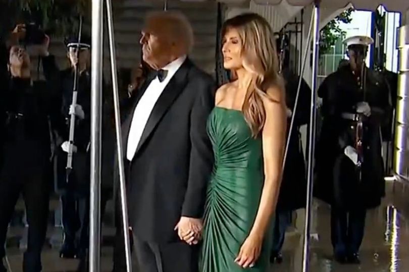 Melania appears 'tense' as she joins husband Donald Trump at White ...