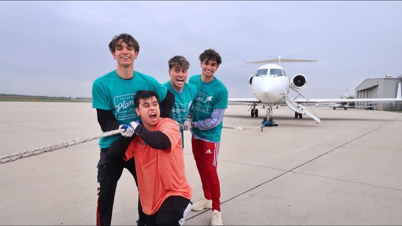 How a Group of Friends Ended Up Pulling a Broken Plane for Charity