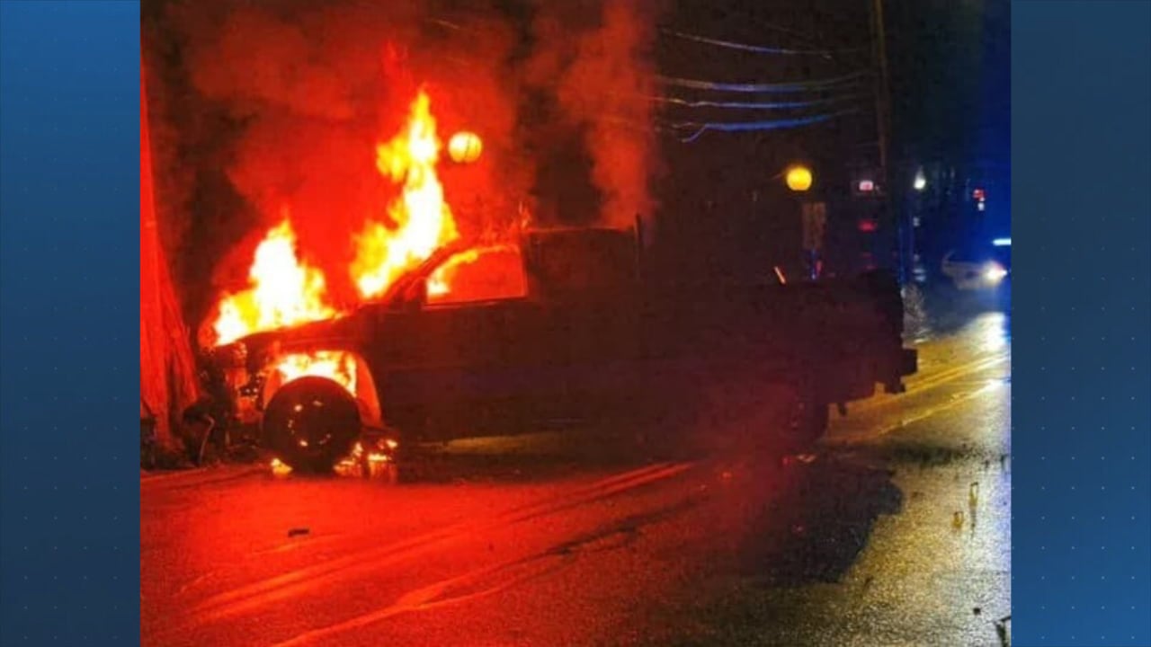 Police officer rescues person from burning truck, driver charged with OUI