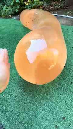 Inflating A Worm Toy Until It Got Huge
