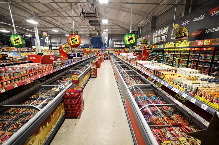 Over 100 customers line up for opening of new Food Warehouse store ...