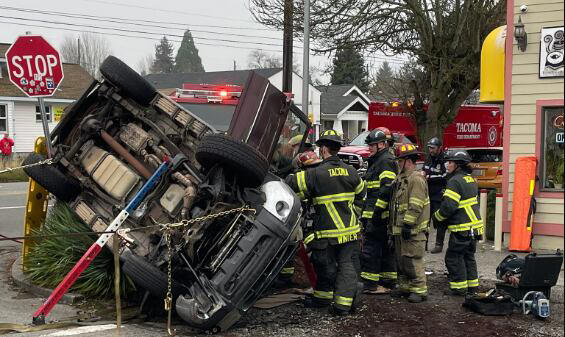 Driver pulled from rollover crash in Tacoma