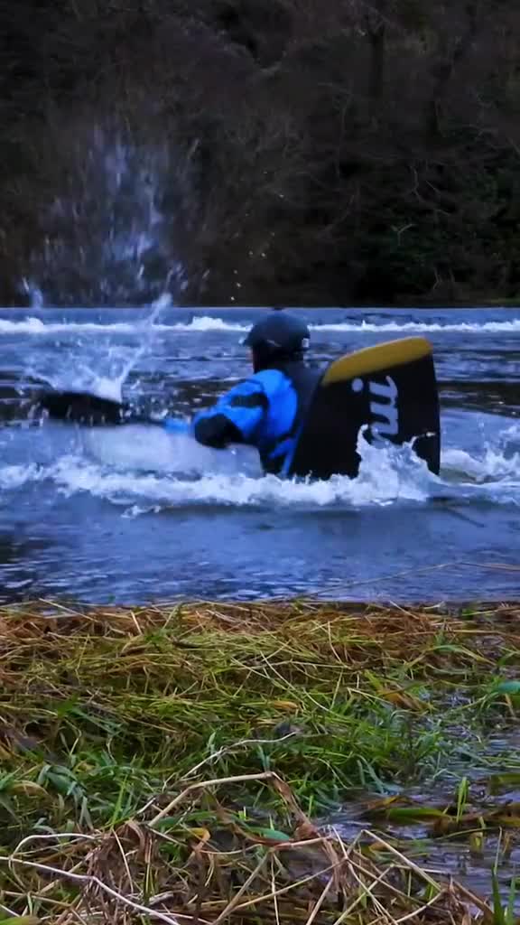 Nailing Kayak Tricks on the River Rapids