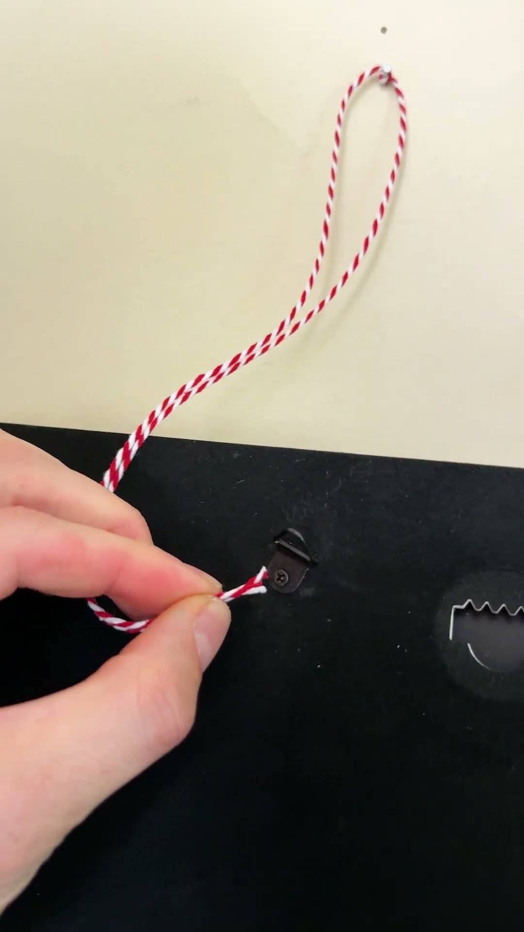 Genius way to hang a picture frame