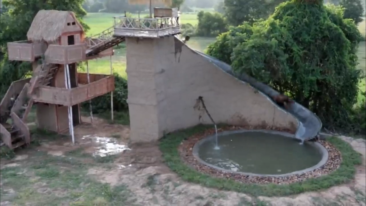 A zero-cost forest palace with pool and slide that outshines million ...