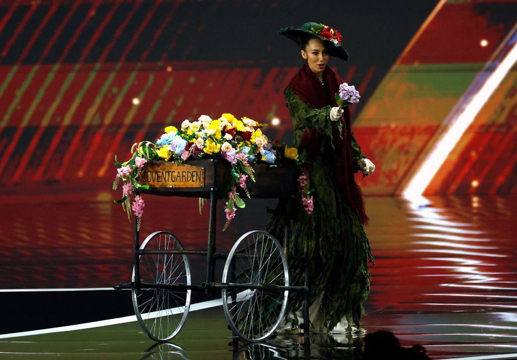 Miss Great Britain Danielle Latimer falls on stage as she competes in ...