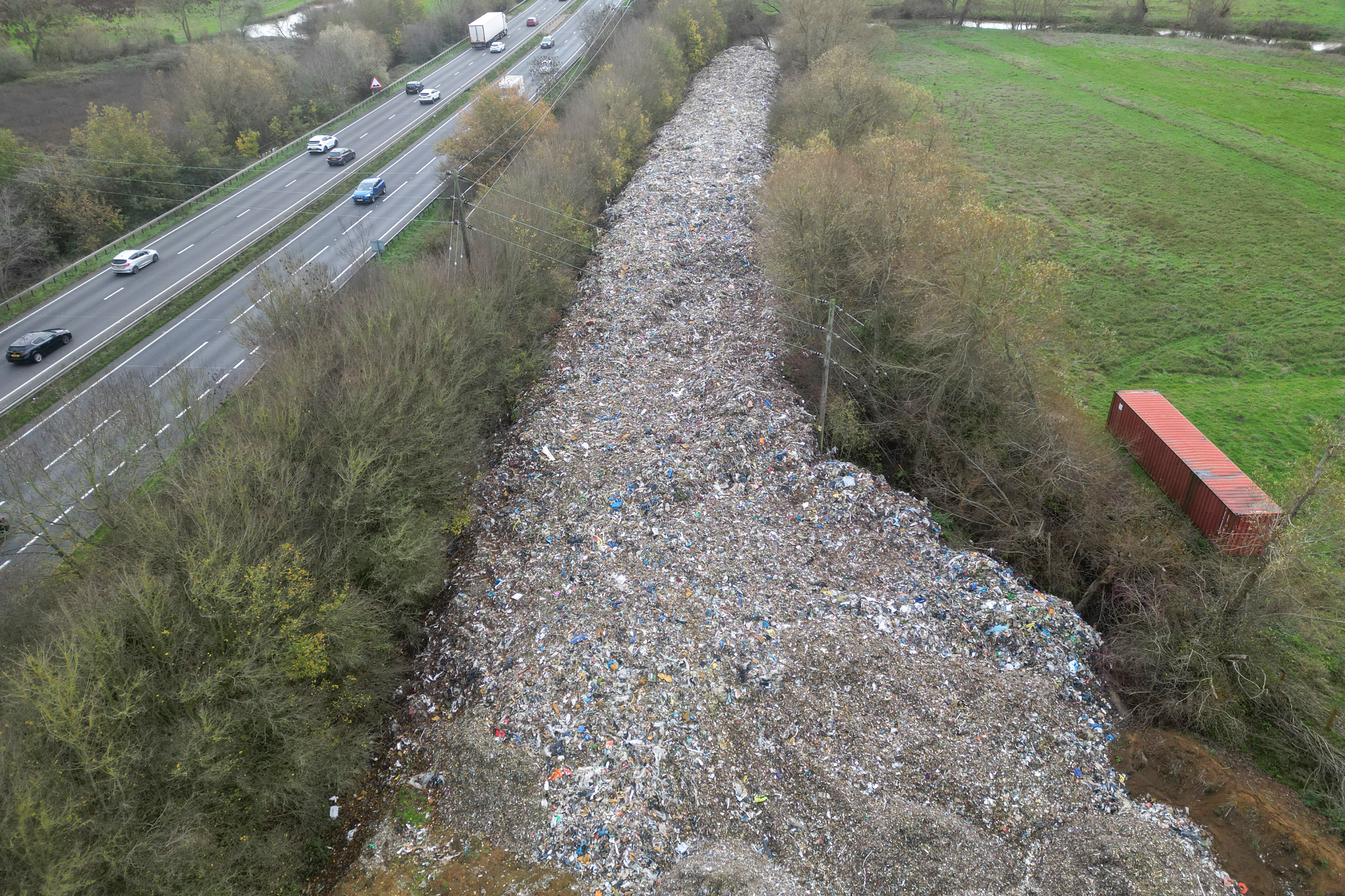 Two men arrested over 'catastrophic' 500ft fly-tipped mountain of waste