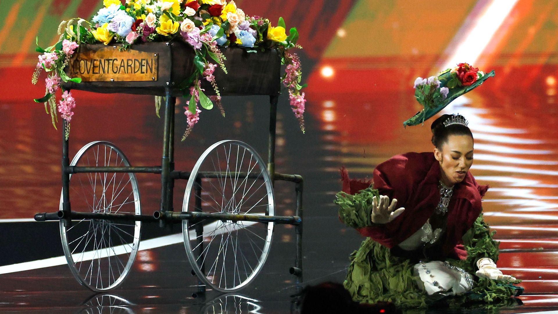 Miss Great Britain Danielle Latimer falls on stage as she competes in ...