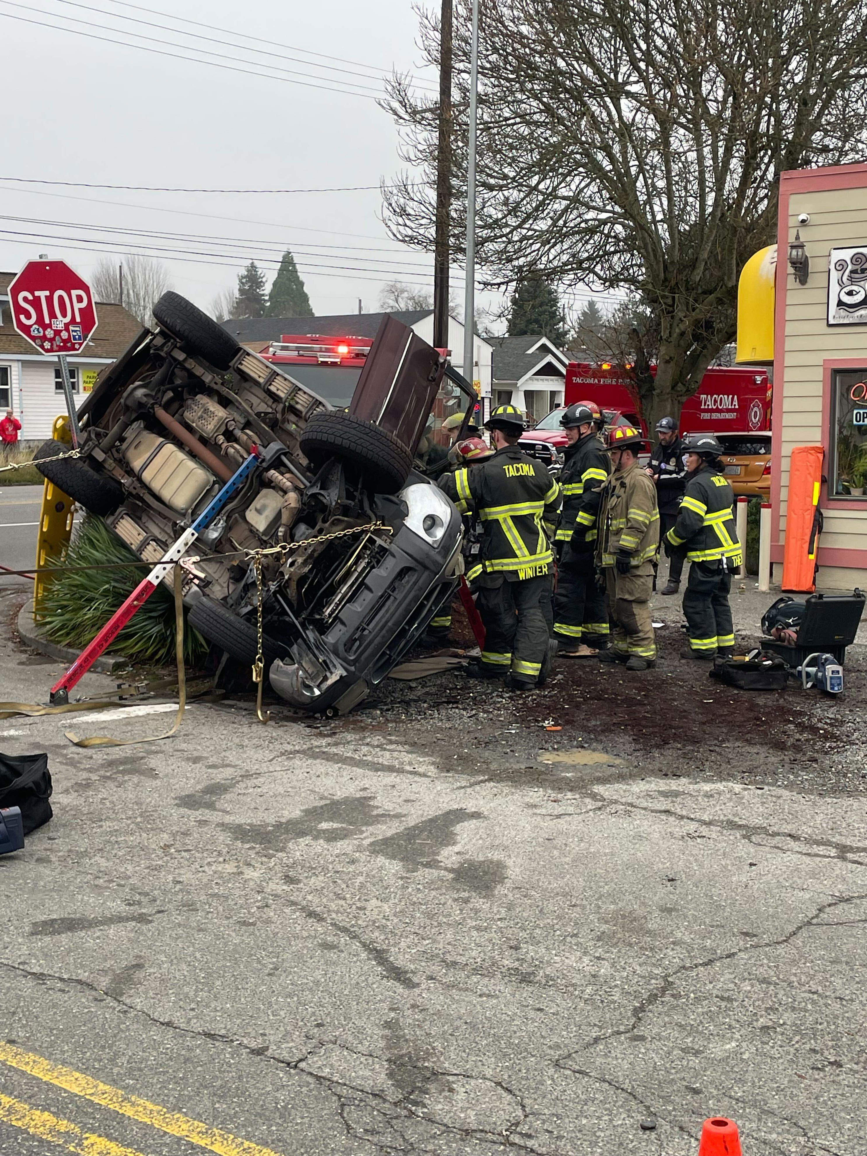 Driver extracted from vehicle after rollover crash in Tacoma