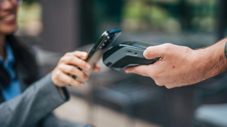What Is 'Ghost Tapping'? The New Tap-To-Pay Scam You Should Know About