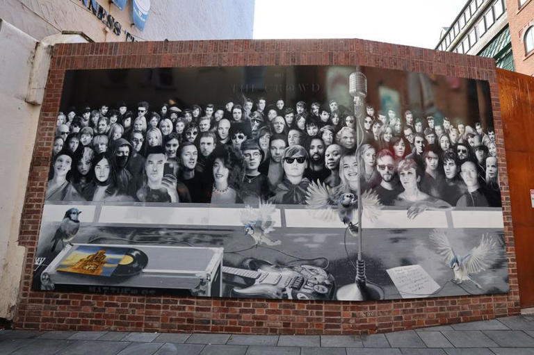 Huge mural with 100 famous faces unveiled on city street