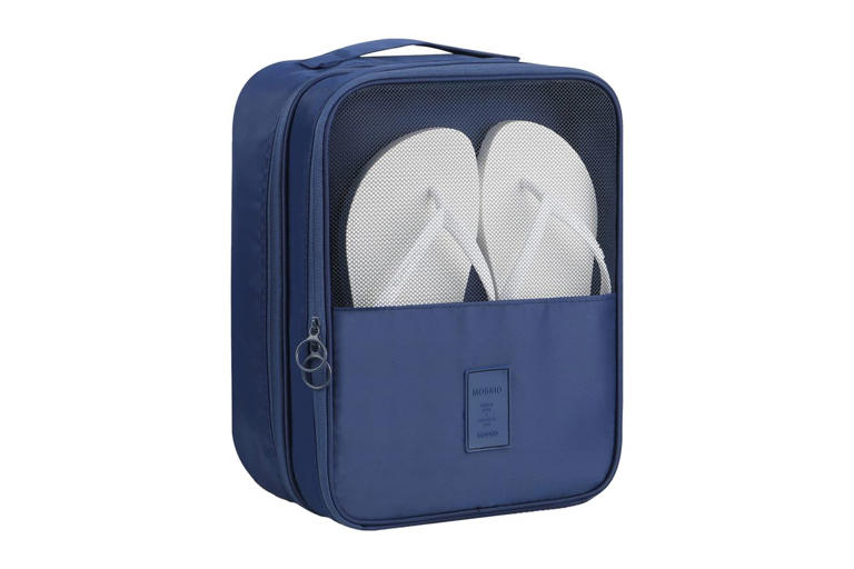 A microbiologist says most travelers are guilty of this germ-spreading ...