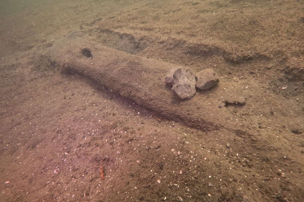 Archaeologists uncover 16 canoes in prehistoric lake ‘parking lot’