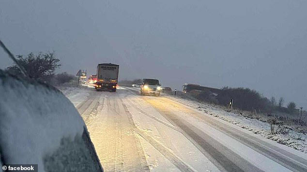Hundreds of motorists are stranded as heavy snow falls in North ...