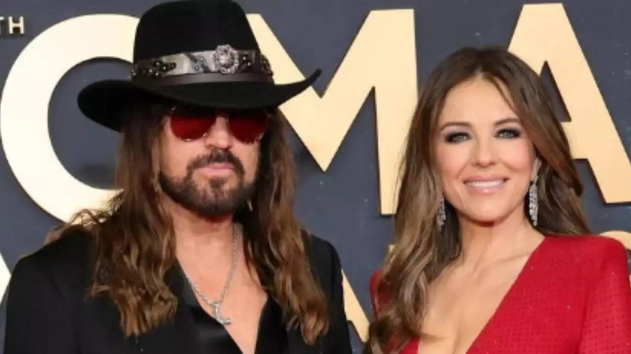Elizabeth Hurley and Billy Ray Cyrus attend CMAs 2025 in style; duo ...