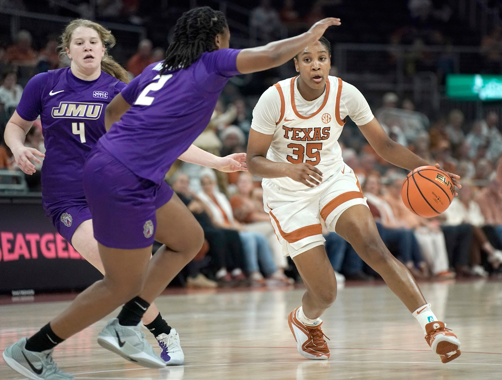 Booker's all-around performance leads No. 4 Texas to a 95-56 win ...