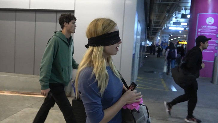 Addison Rae Wears Eye Mask On Her Way Out of Airport