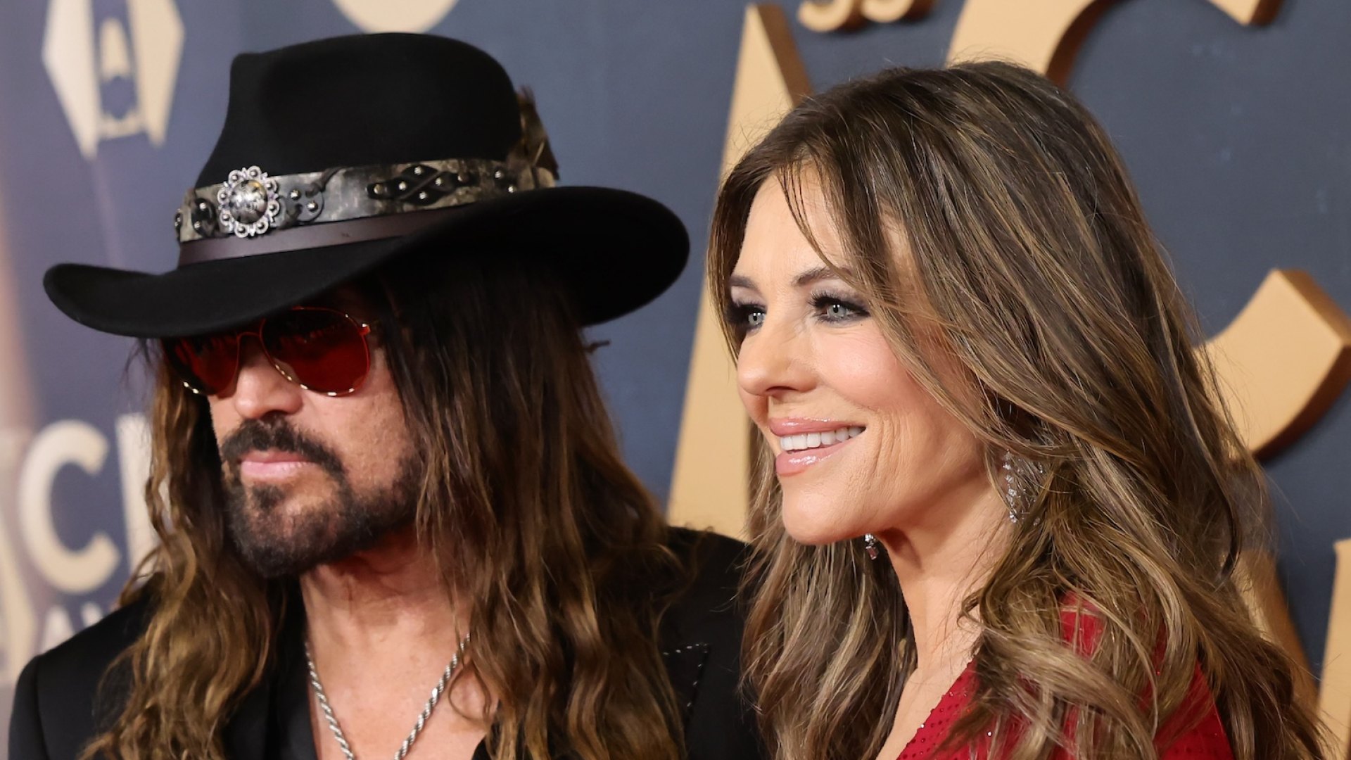 Billy Ray Cyrus and Elizabeth Hurley Walk 1st U.S. Red Carpet at 2025 CMAs