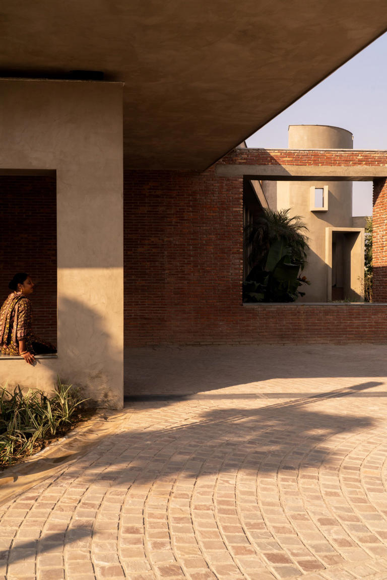 Courtyard acts as "spatial and emotional nucleus" of Indian house by Renesa