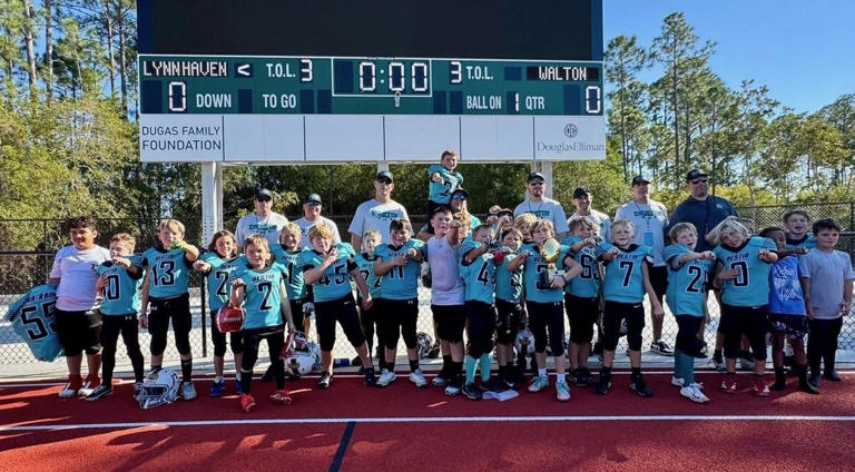 Destin Dolphin Peewees win PYFA Super Bowl
