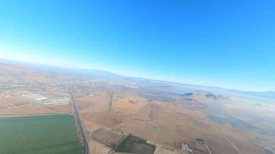 Man jumps from a hot air balloon at sunrise in a wild California ...