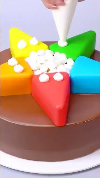 yummy rainbow cake with marshmallow topping