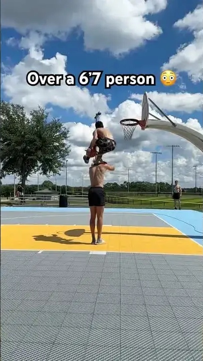 Dunking over a 6'7" person