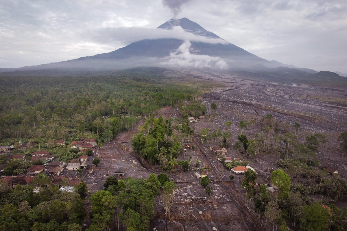 More than 170 climbers rescued as Mt Semeru eruption blankets villages