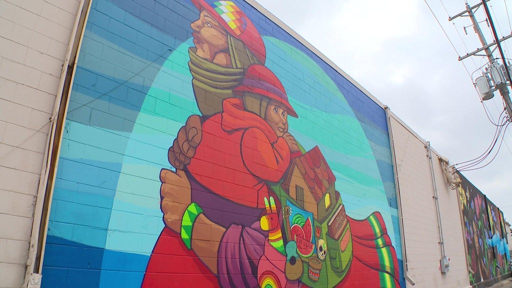 St. Paul business targeted by ICE operation features mural honoring migrants