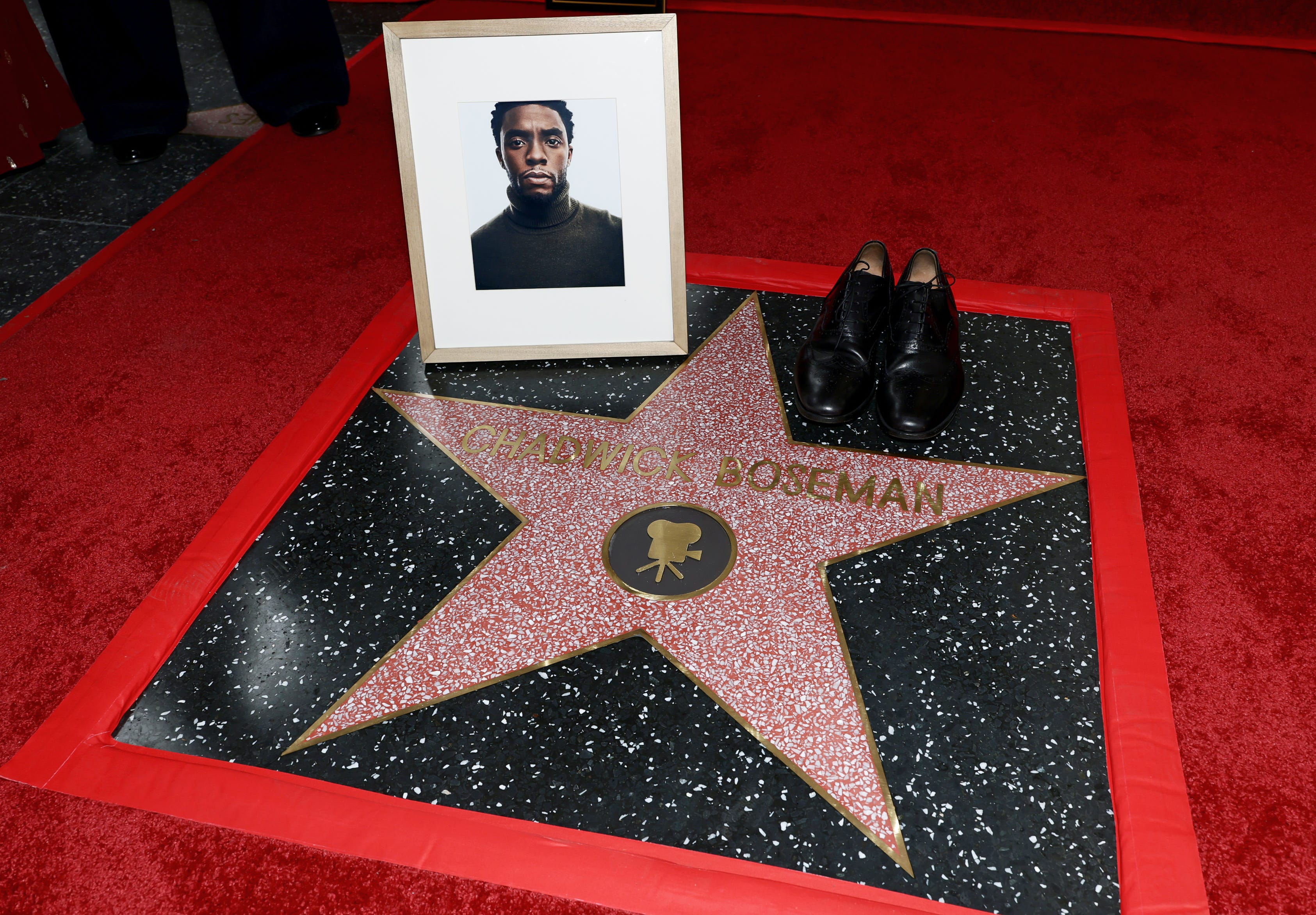 Hollywood Walk of Fame honors Chadwick Boseman; wife, brothers attend