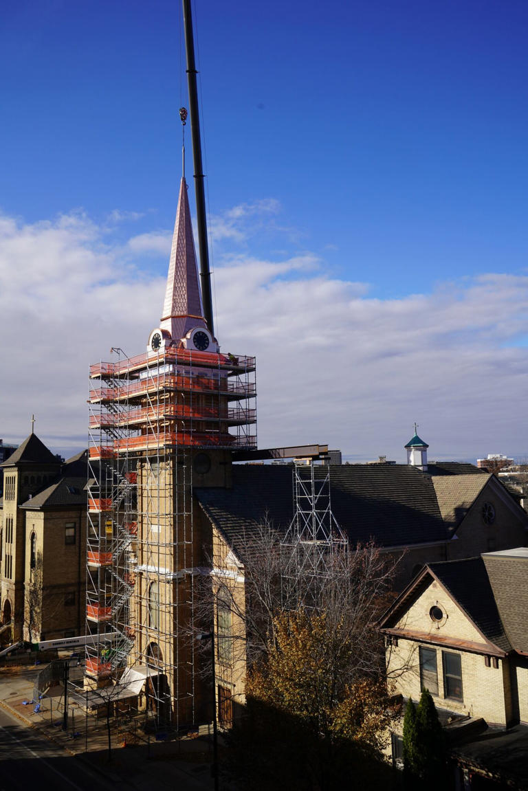 Crews lift new steeple onto Holy Redeemer Church after 2024 fire